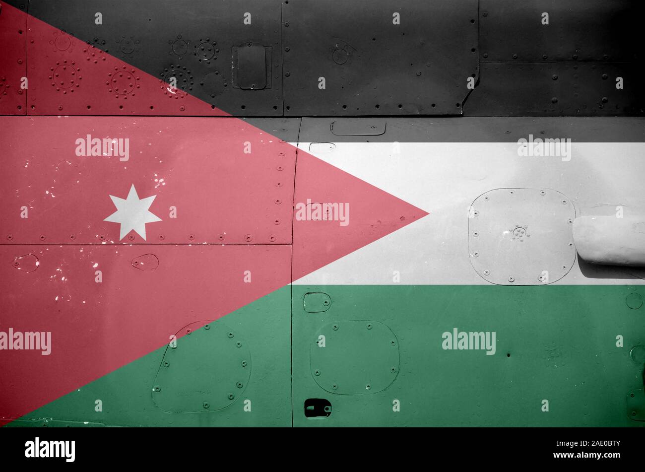 Jordan flag depicted on side part of military armored helicopter close ...