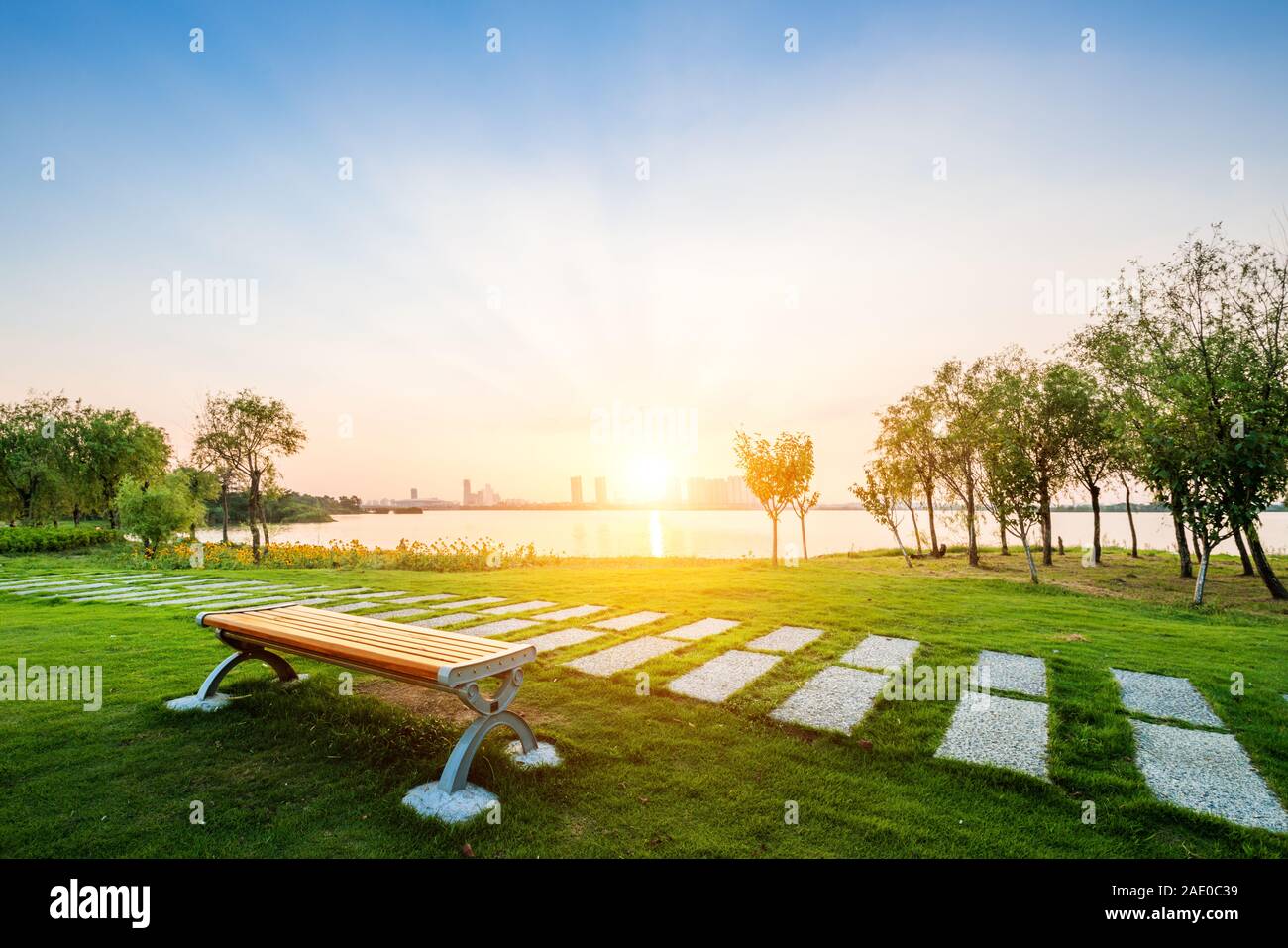 Park Bench in the Morning Light Stock Photo - Alamy