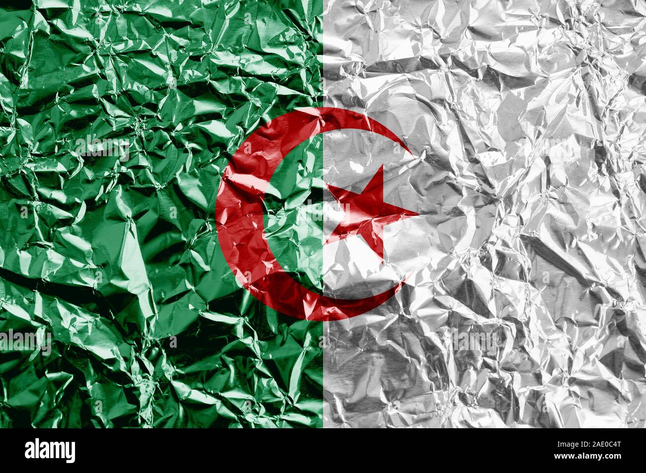 Algeria flag depicted in paint colors on shiny crumpled aluminium foil ...