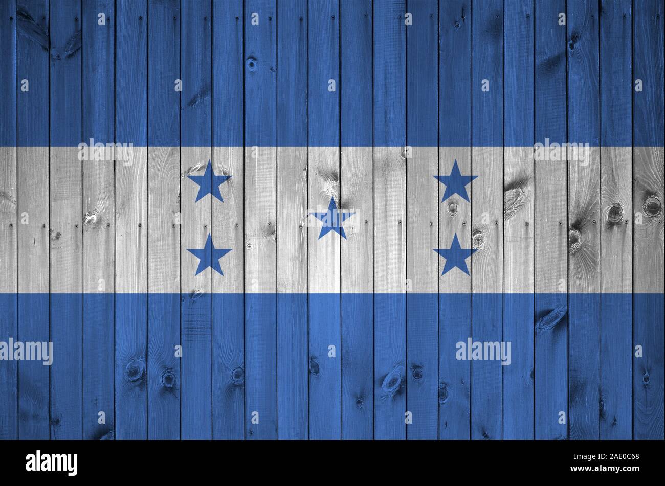 Honduras flag depicted in bright paint colors on old wooden wall close ...