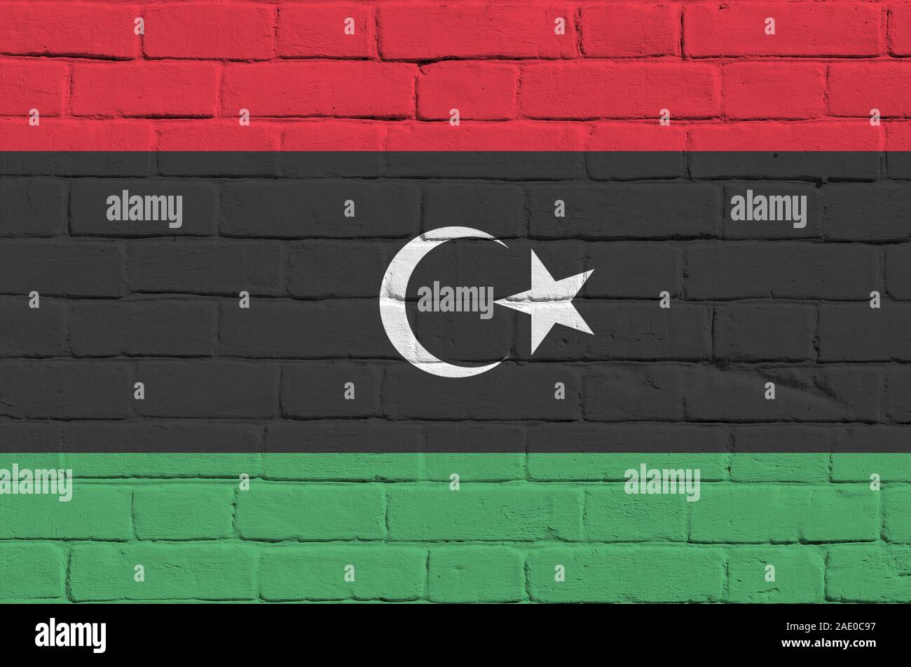 Libya flag depicted in paint colors on old brick wall close up ...