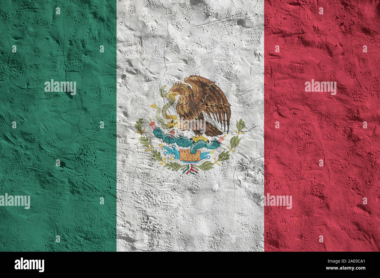 Mexico flag depicted in bright paint colors on old relief plastering ...