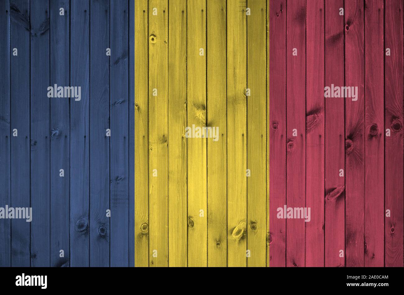 Chad flag depicted in bright paint colors on old wooden wall close up ...