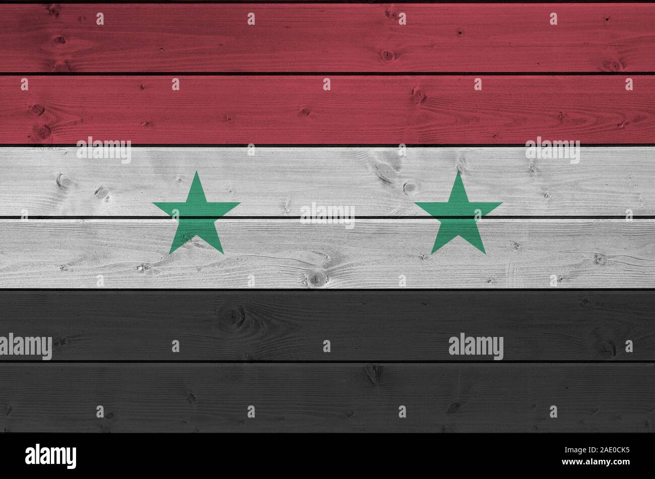 Syria flag depicted in bright paint colors on old wooden wall close up ...