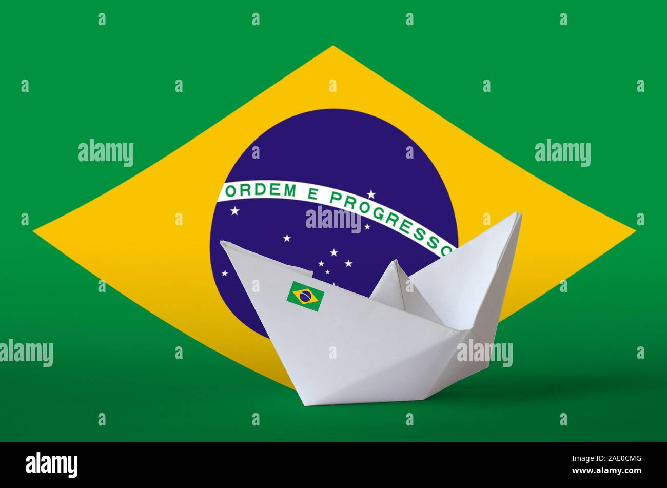 Brazil flag depicted on paper origami ship closeup. Oriental handmade ...