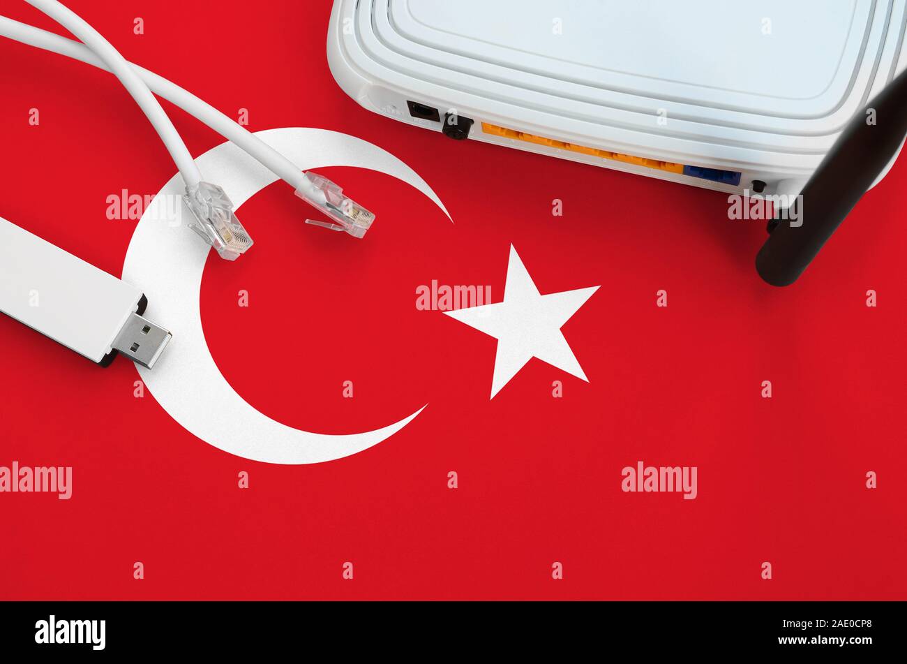 Turkey flag depicted on table with internet rj45 cable, wireless usb wi ...