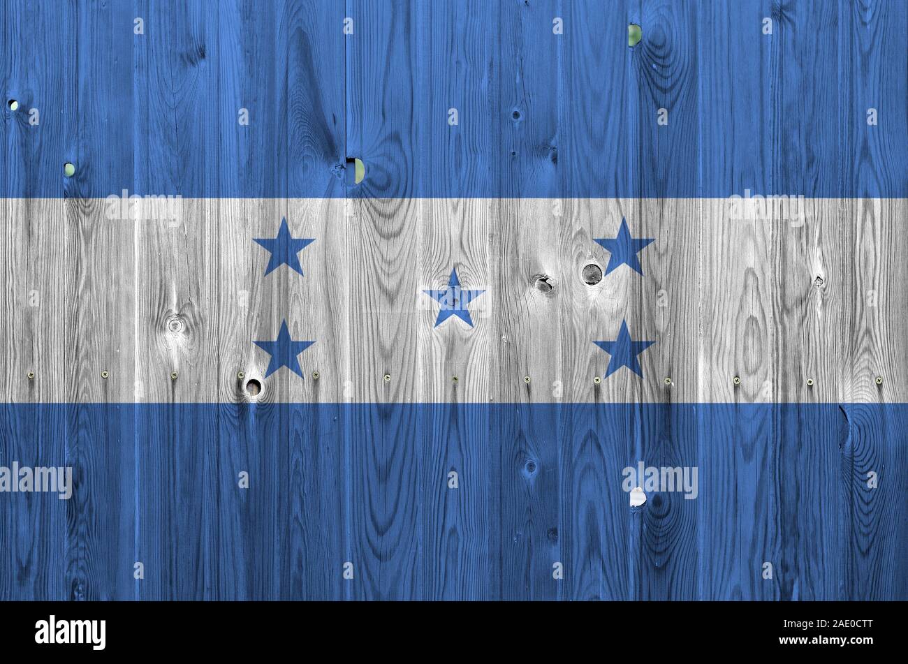 Honduras flag depicted in bright paint colors on old wooden wall close ...