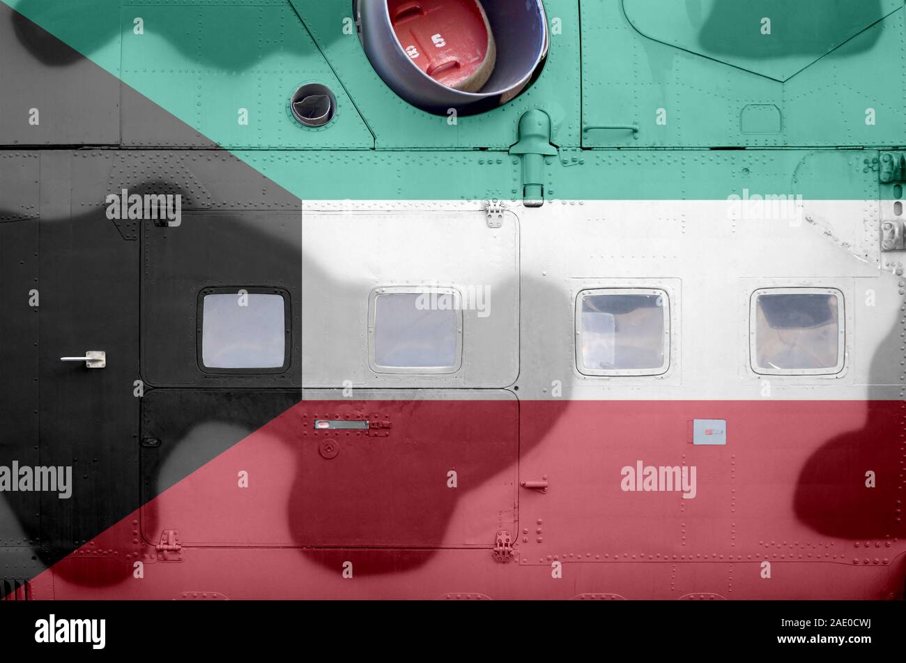 Kuwait flag depicted on side part of military armored helicopter close ...