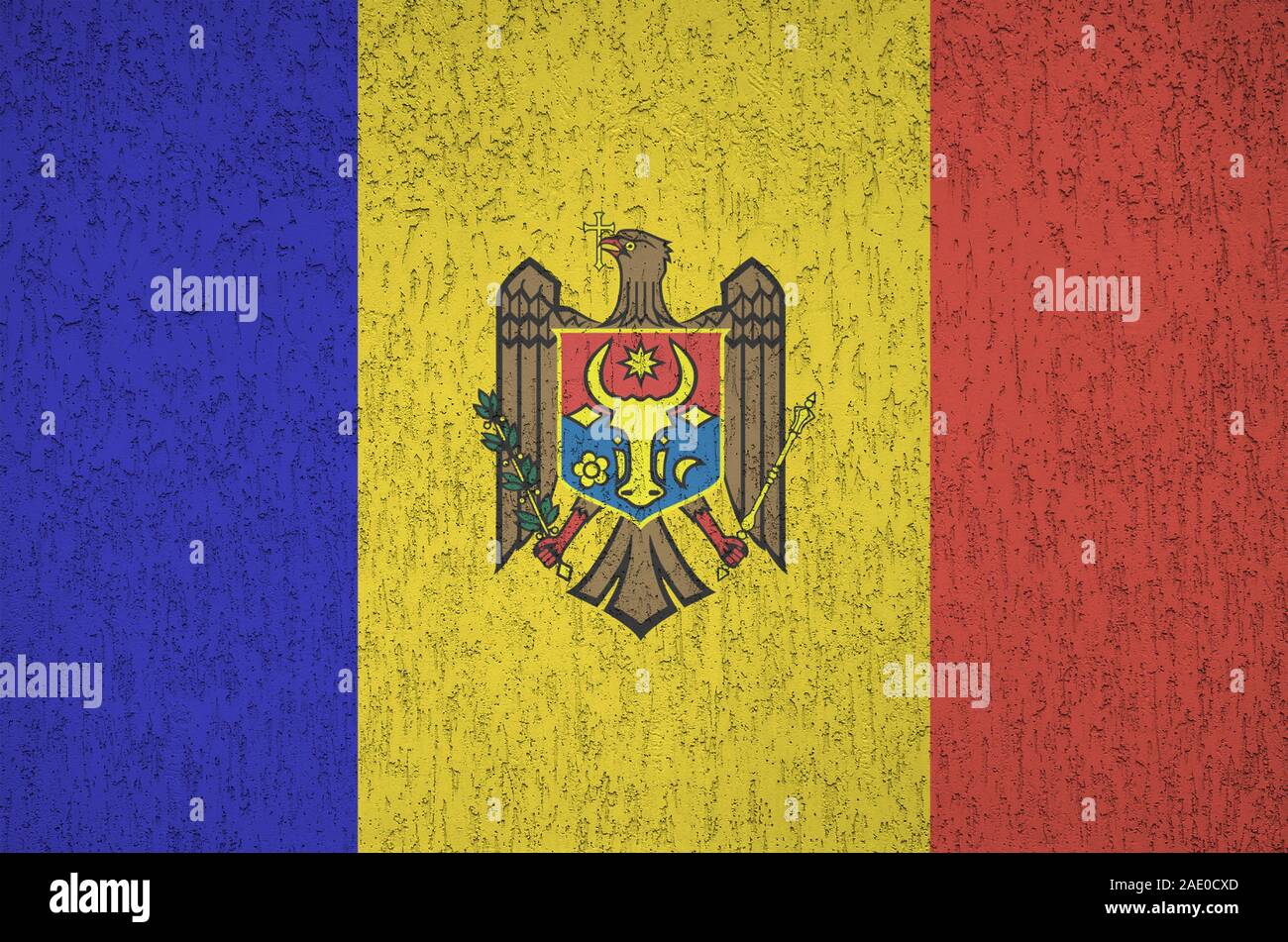 Moldova flag depicted in bright paint colors on old relief plastering ...