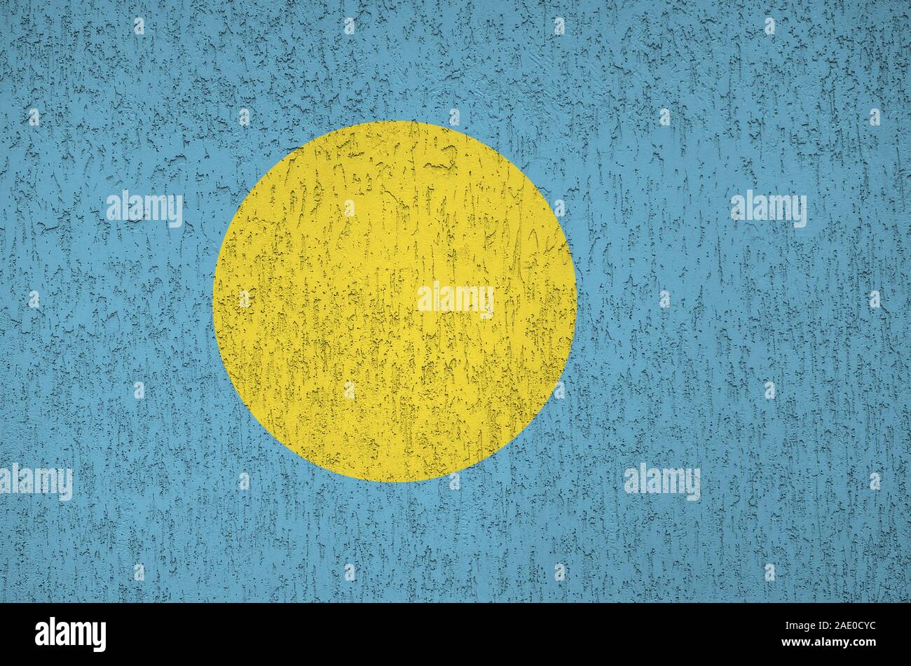 Palau flag depicted in bright paint colors on old relief plastering ...