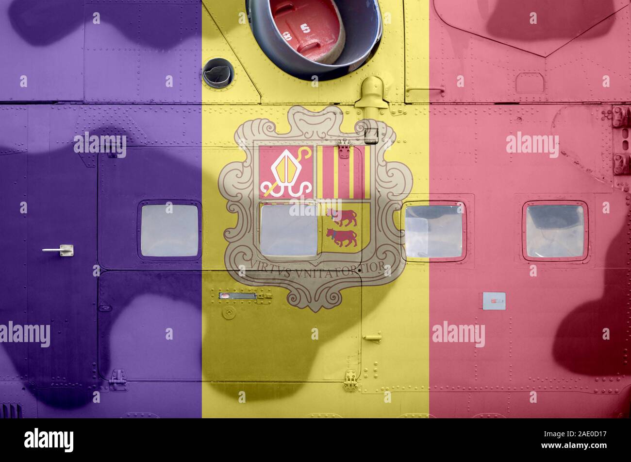 Andorra flag depicted on side part of military armored helicopter close ...