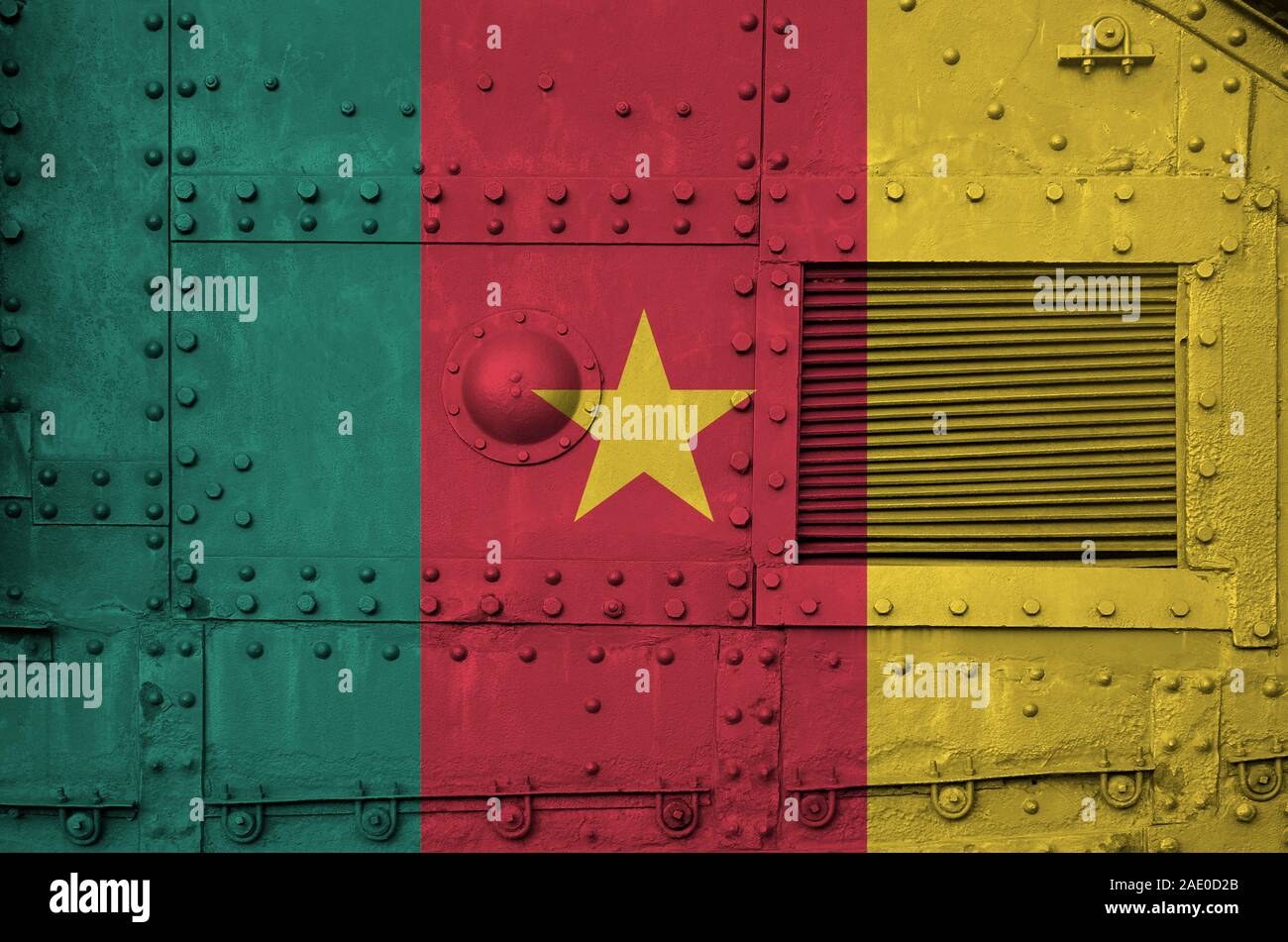 Cameroon flag depicted on side part of military armored tank close up ...