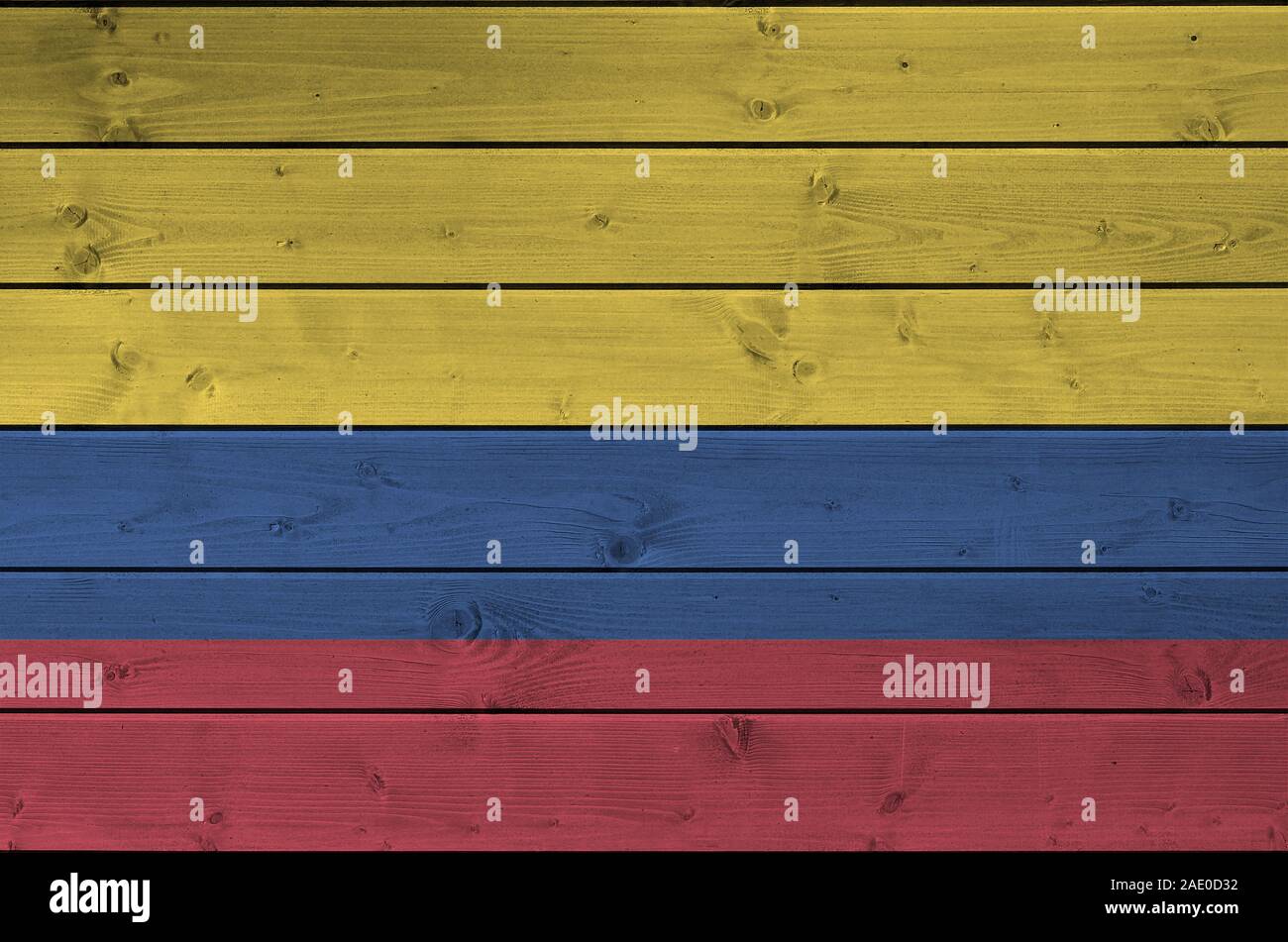 Colombia flag depicted in bright paint colors on old wooden wall close ...