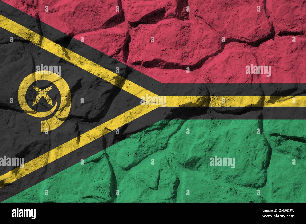 Vanuatu flag depicted in paint colors on old stone wall close up ...