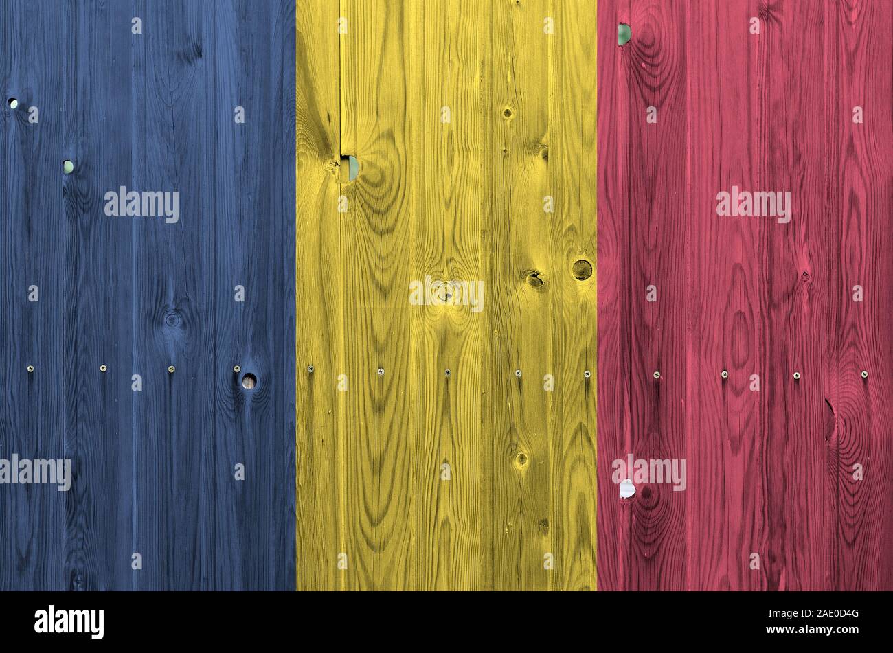 Chad flag depicted in bright paint colors on old wooden wall close up ...