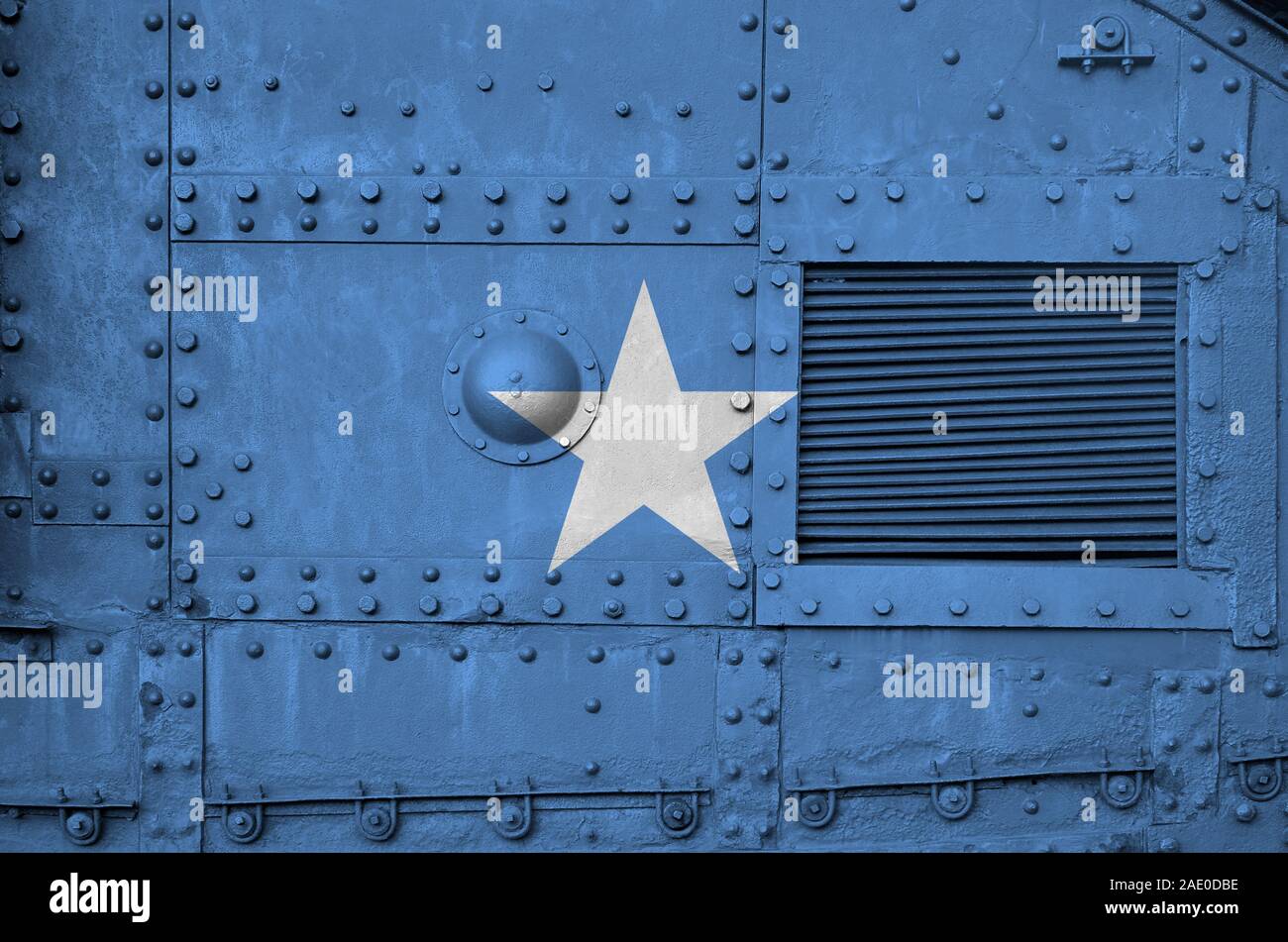 Somalia flag depicted on side part of military armored tank close up ...