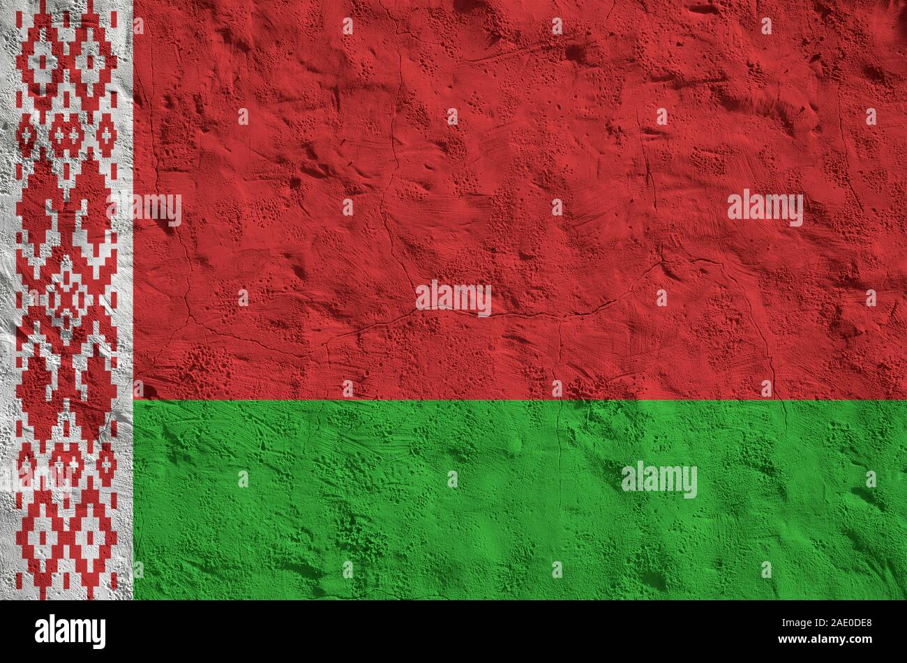 Belarus flag depicted in bright paint colors on old relief plastering ...