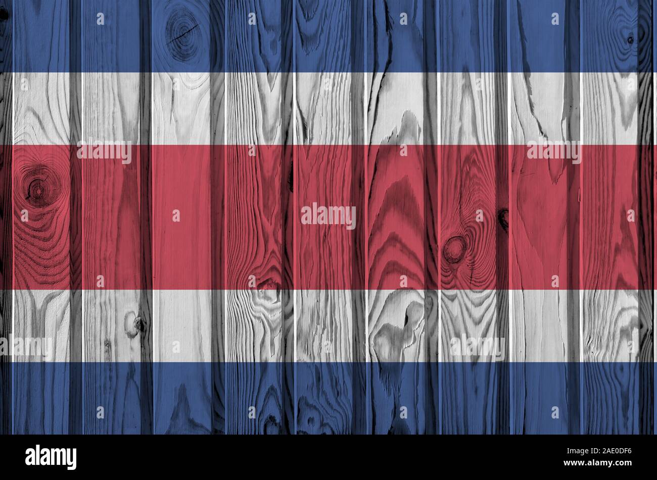 Costa Rica flag depicted in bright paint colors on old wooden wall ...