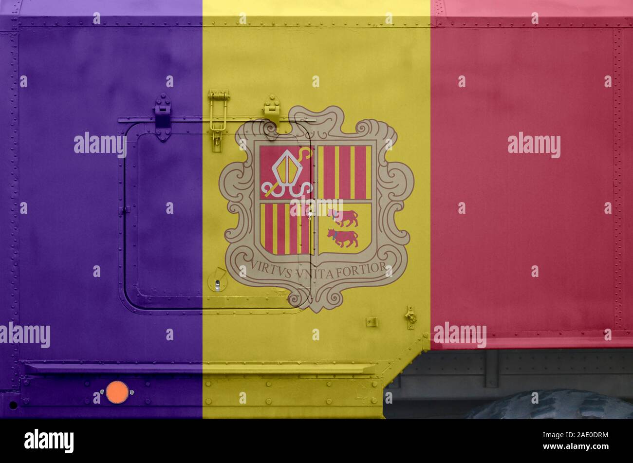 Andorra flag depicted on side part of military armored truck close up ...