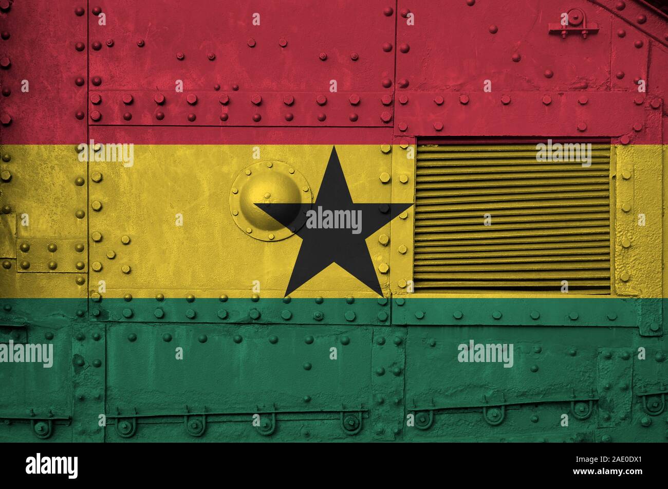 Ghana flag depicted on side part of military armored tank close up ...
