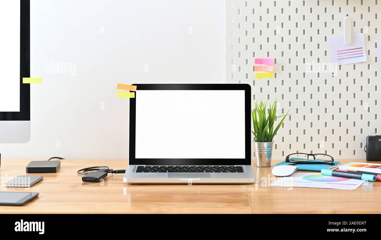 Workspace laptop computer on creative workplace with accessories ...