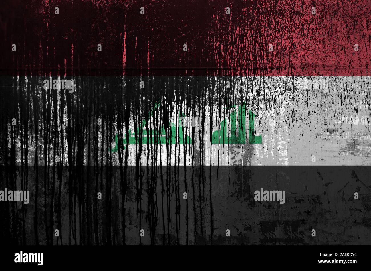 Iraq flag depicted in paint colors on old and dirty oil barrel wall ...