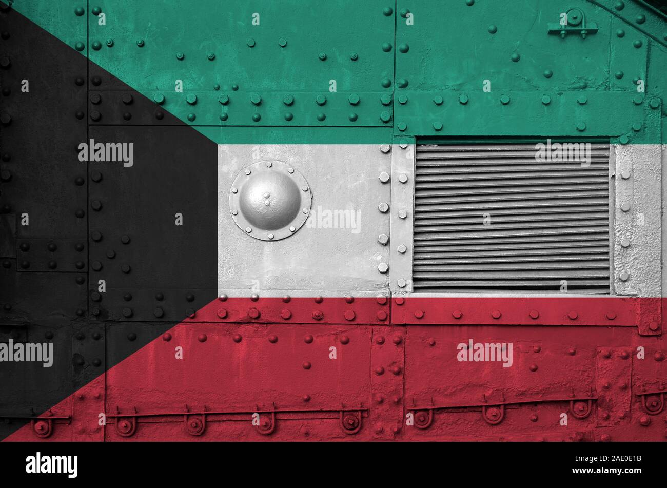 Kuwait flag depicted on side part of military armored tank close up ...