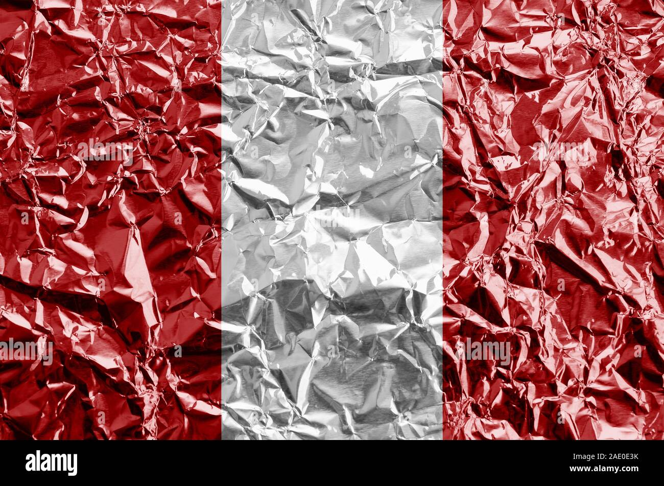 Peru flag depicted in paint colors on shiny crumpled aluminium foil ...