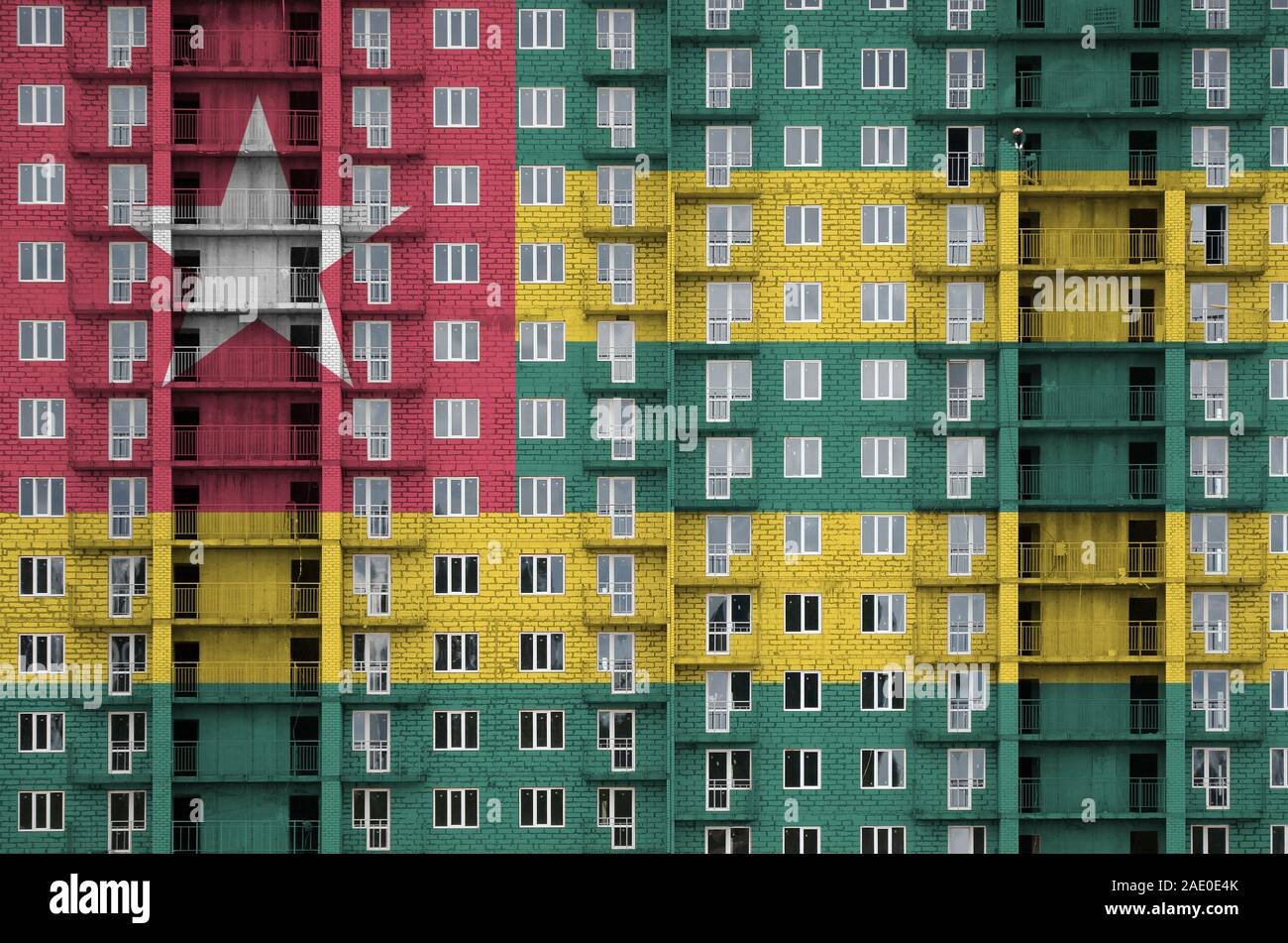 Togo flag depicted in paint colors on multi-storey residental building ...