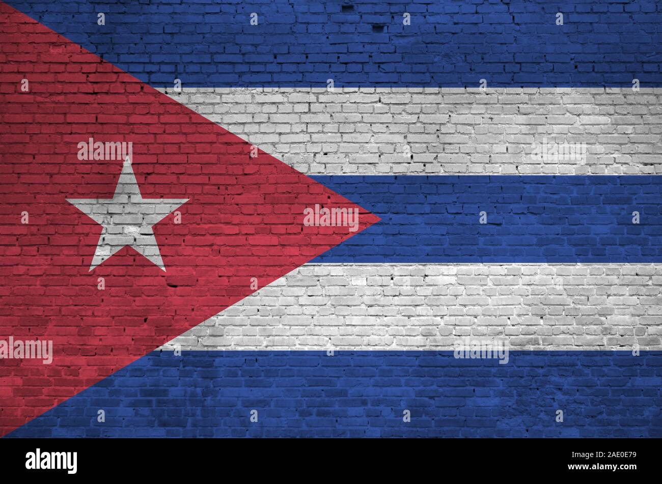 Cuba flag depicted in paint colors on old brick wall close up. Textured ...