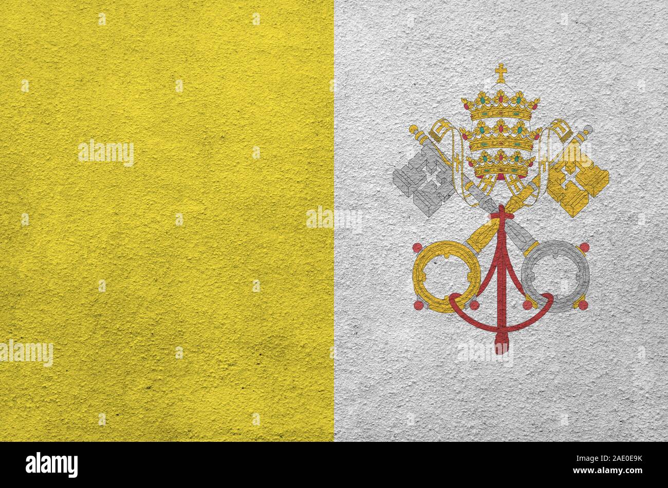 Vatican City State flag depicted in bright paint colors on old relief ...