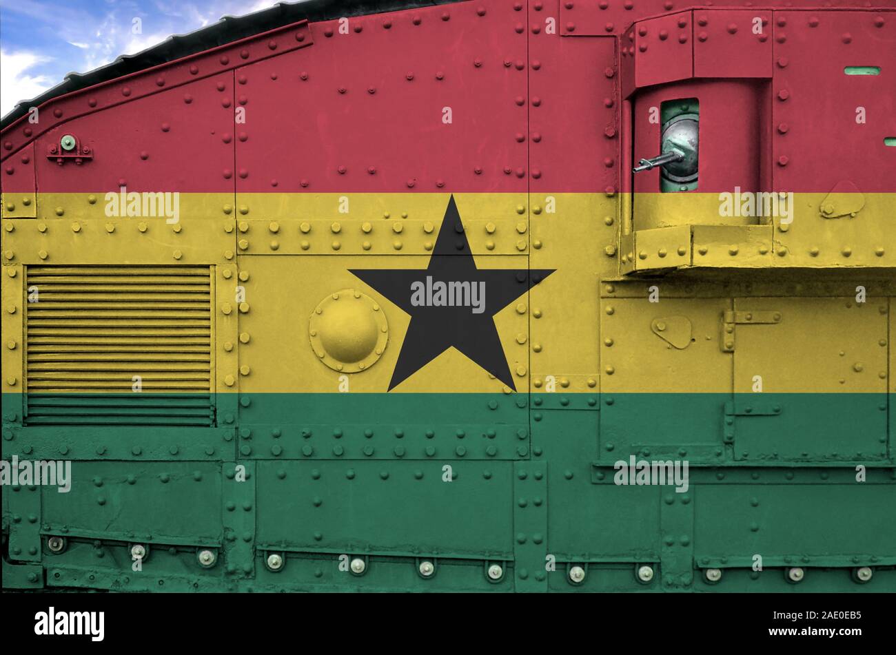 Ghana flag depicted on side part of military armored tank close up ...