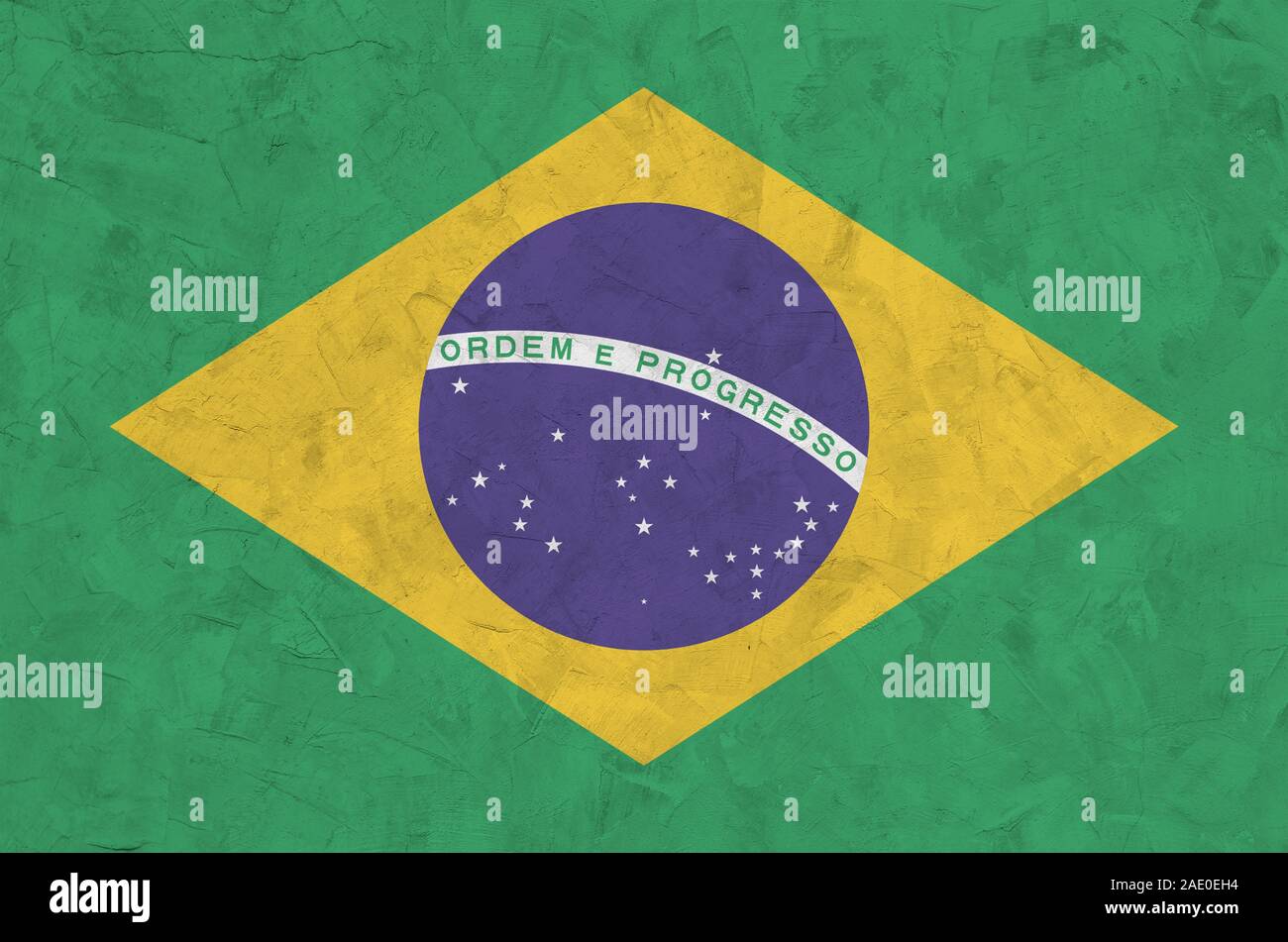 Brazil flag depicted in bright paint colors on old relief plastering ...
