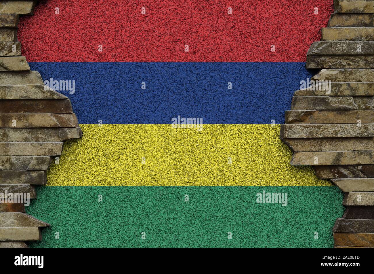 Mauritius flag depicted in paint colors on old stone wall close up ...