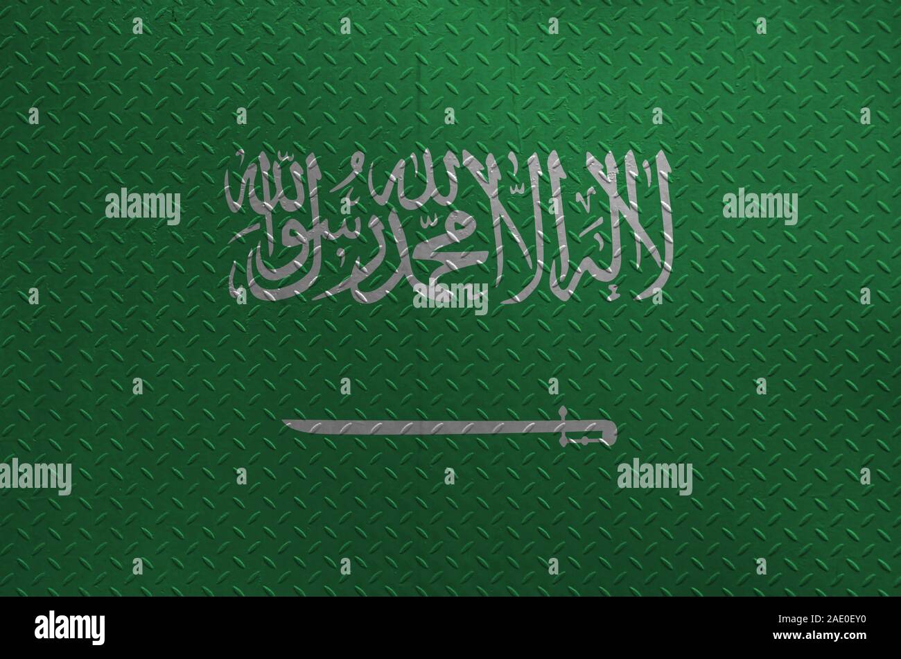 Saudi Arabia flag depicted in paint colors on old brushed metal plate ...