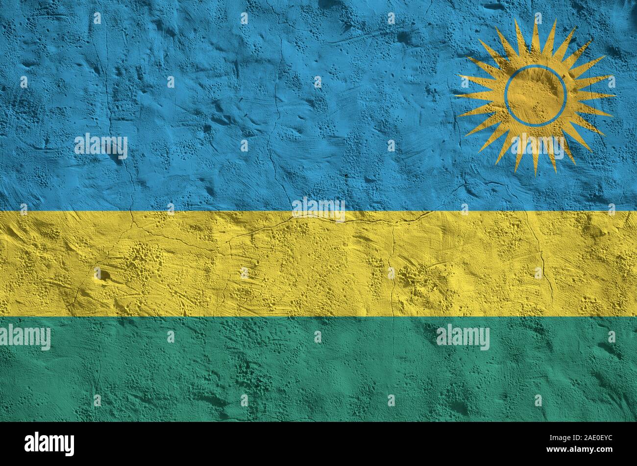 Rwanda flag depicted in bright paint colors on old relief plastering ...