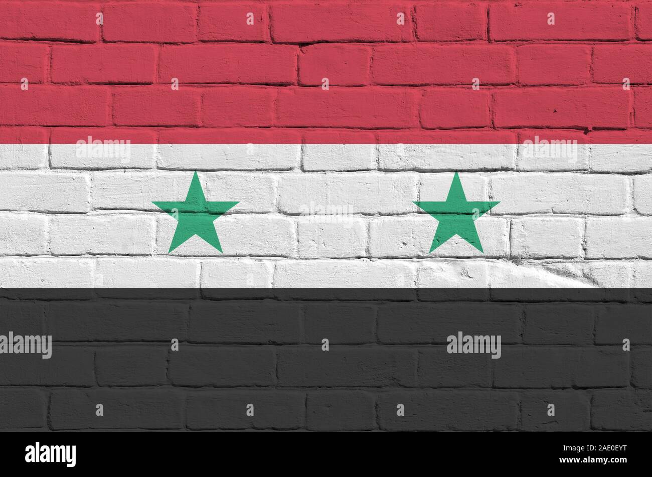 Syria flag depicted in paint colors on old brick wall close up ...