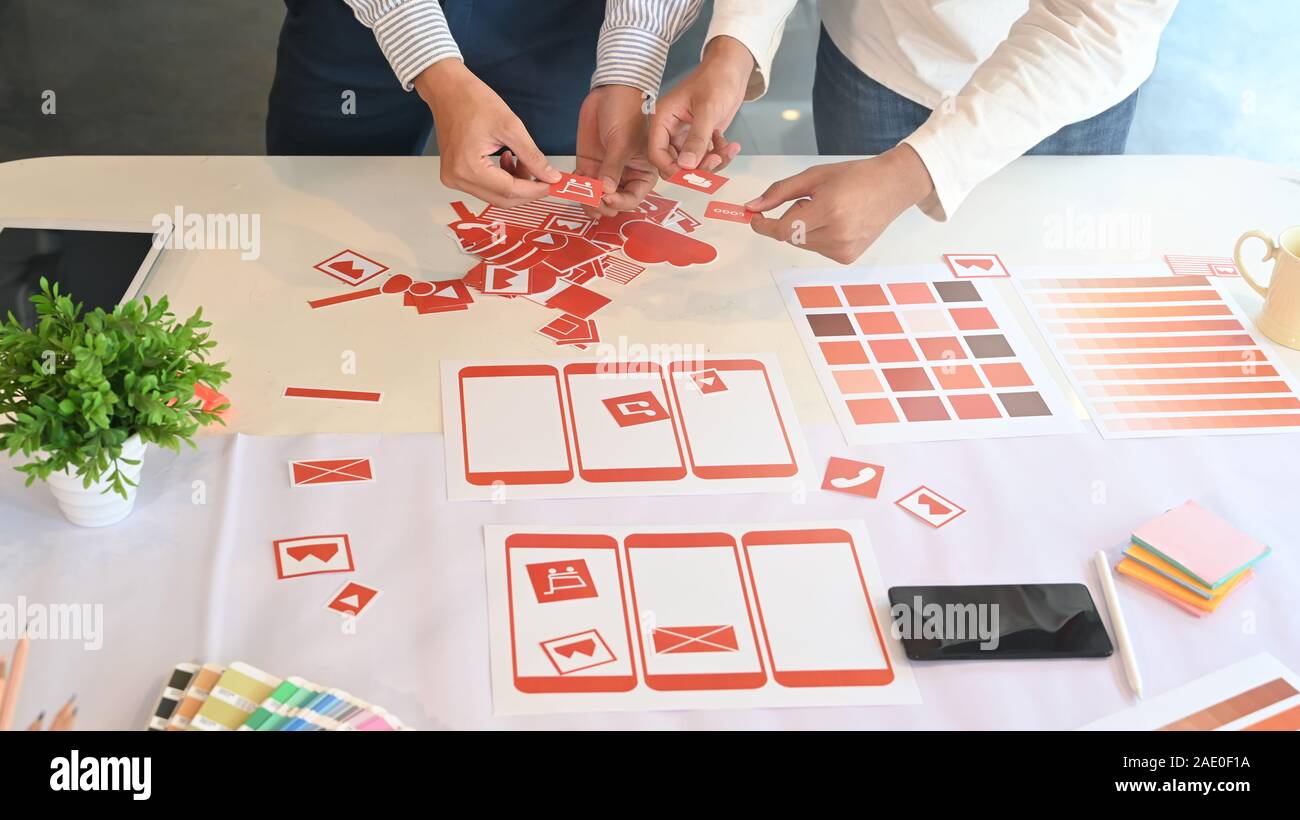 Designer ux ui working desk with compare design of screens for mobile ...