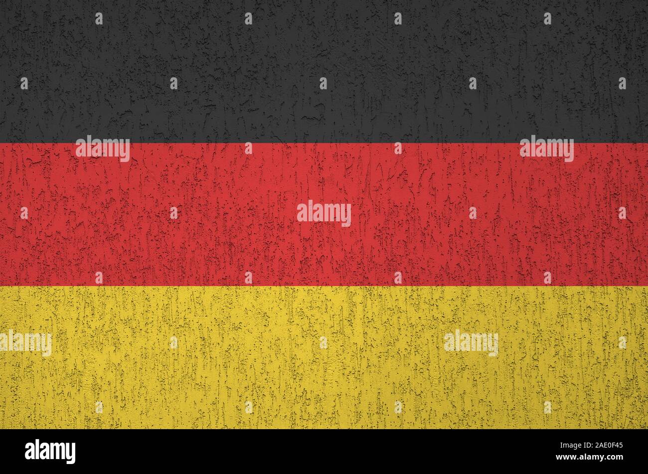 Germany flag depicted in bright paint colors on old relief plastering ...