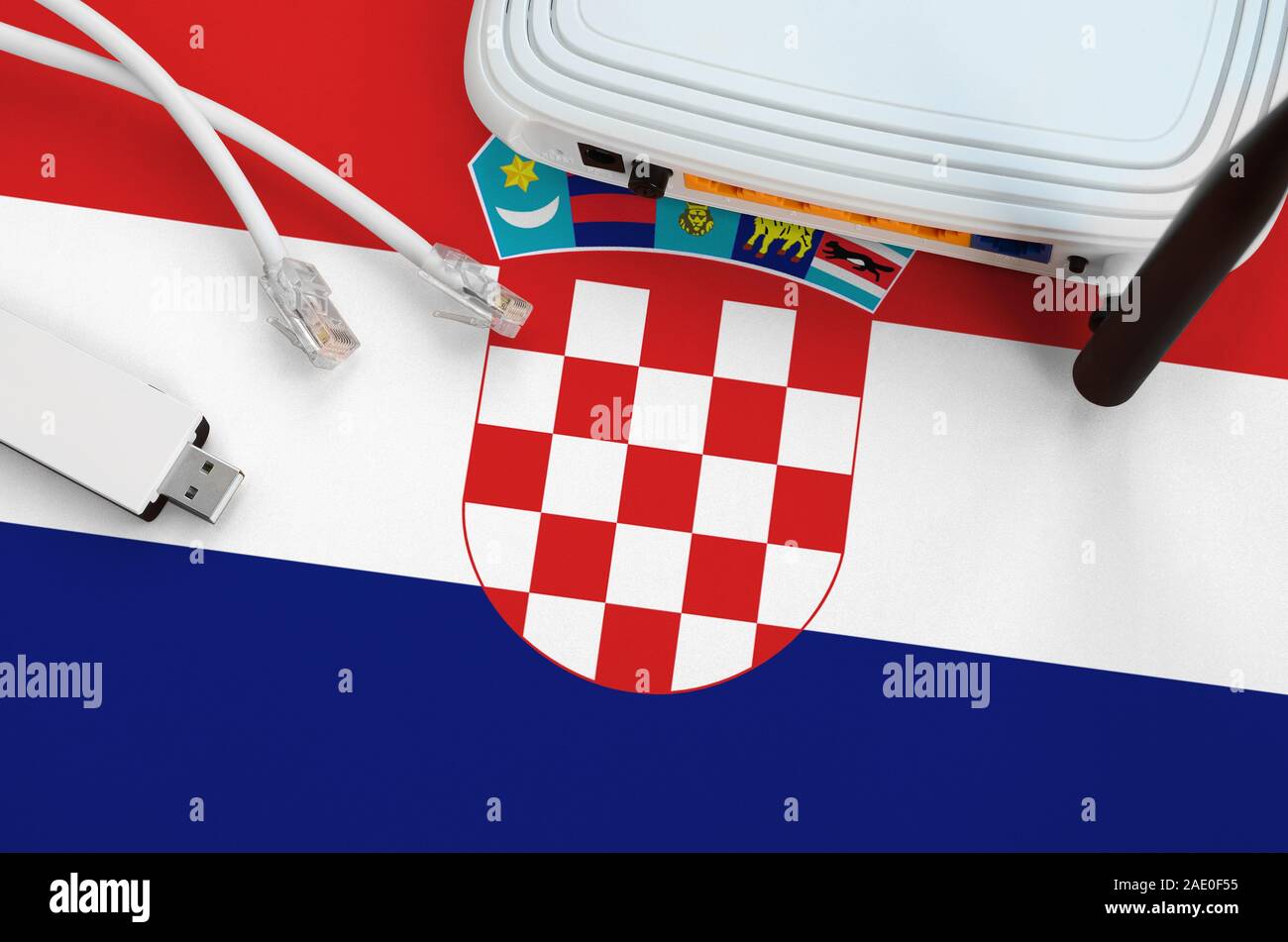 Croatia flag depicted on table with internet rj45 cable, wireless usb ...