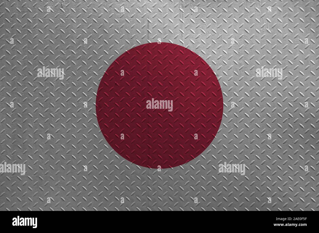 Japan flag depicted in paint colors on old brushed metal plate or wall ...