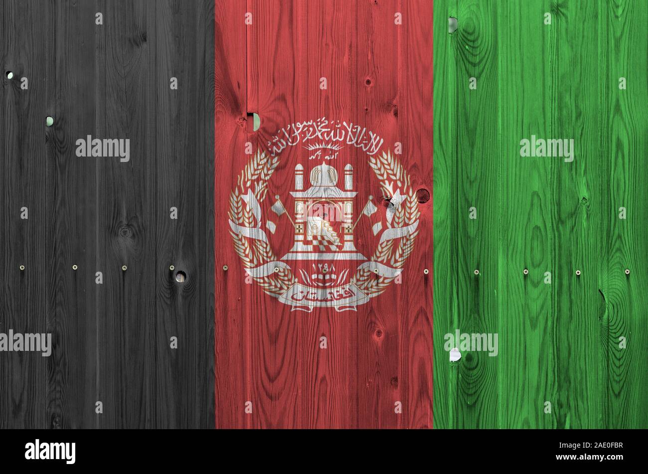 Afghanistan flag depicted in bright paint colors on old wooden wall ...