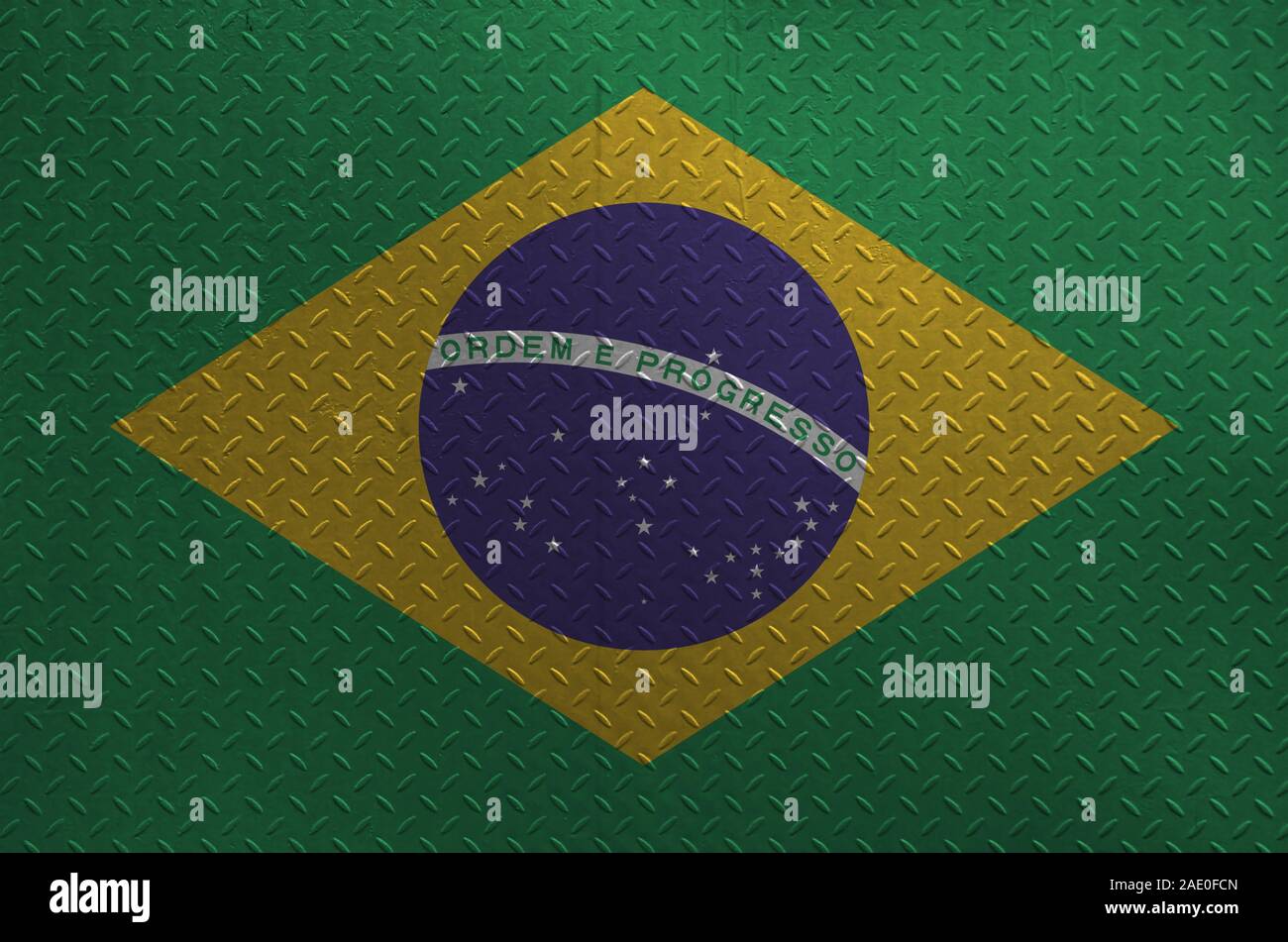 Brazil flag depicted in paint colors on old brushed metal plate or wall ...