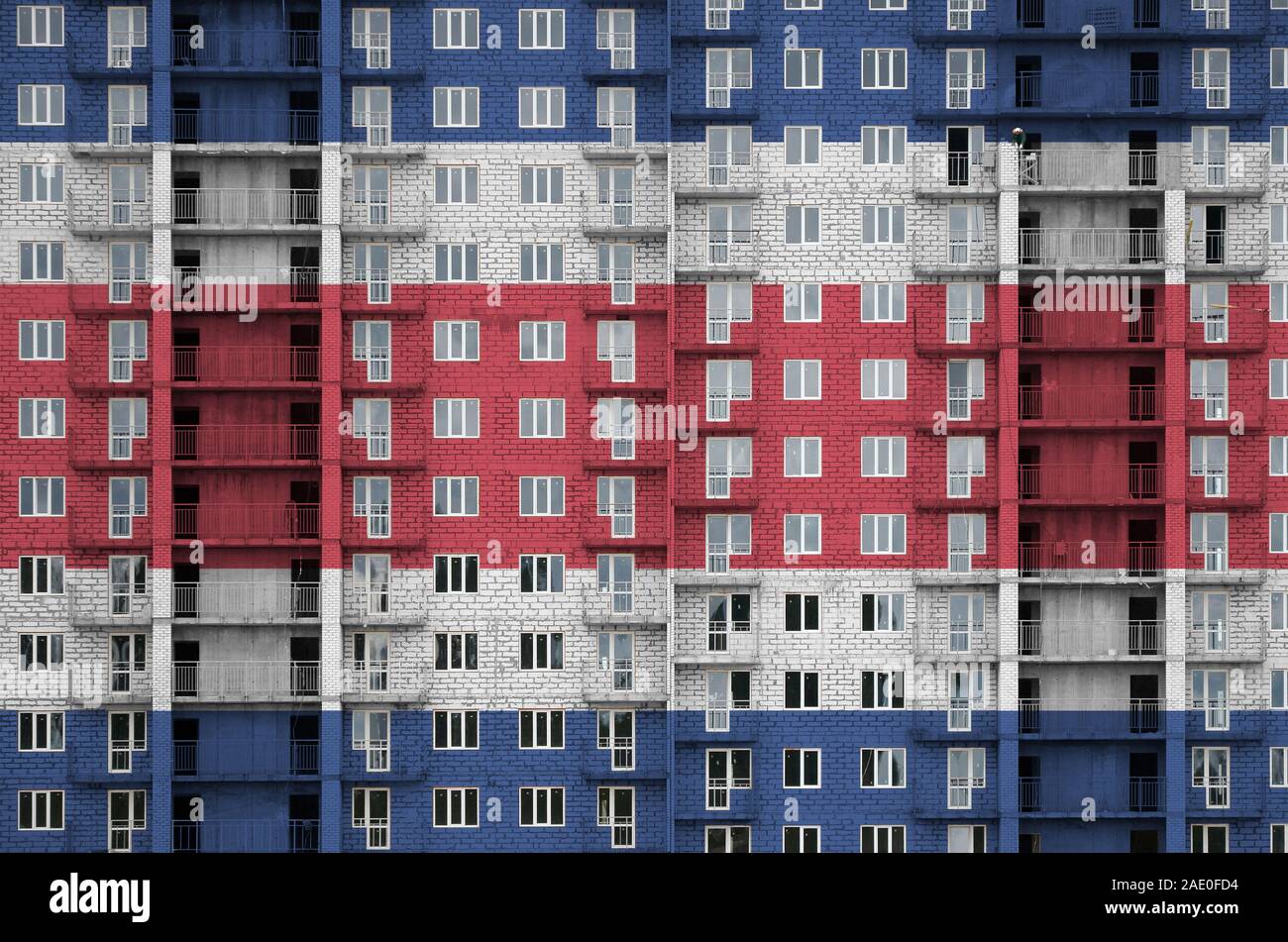 Costa Rica flag depicted in paint colors on multi-storey residental ...