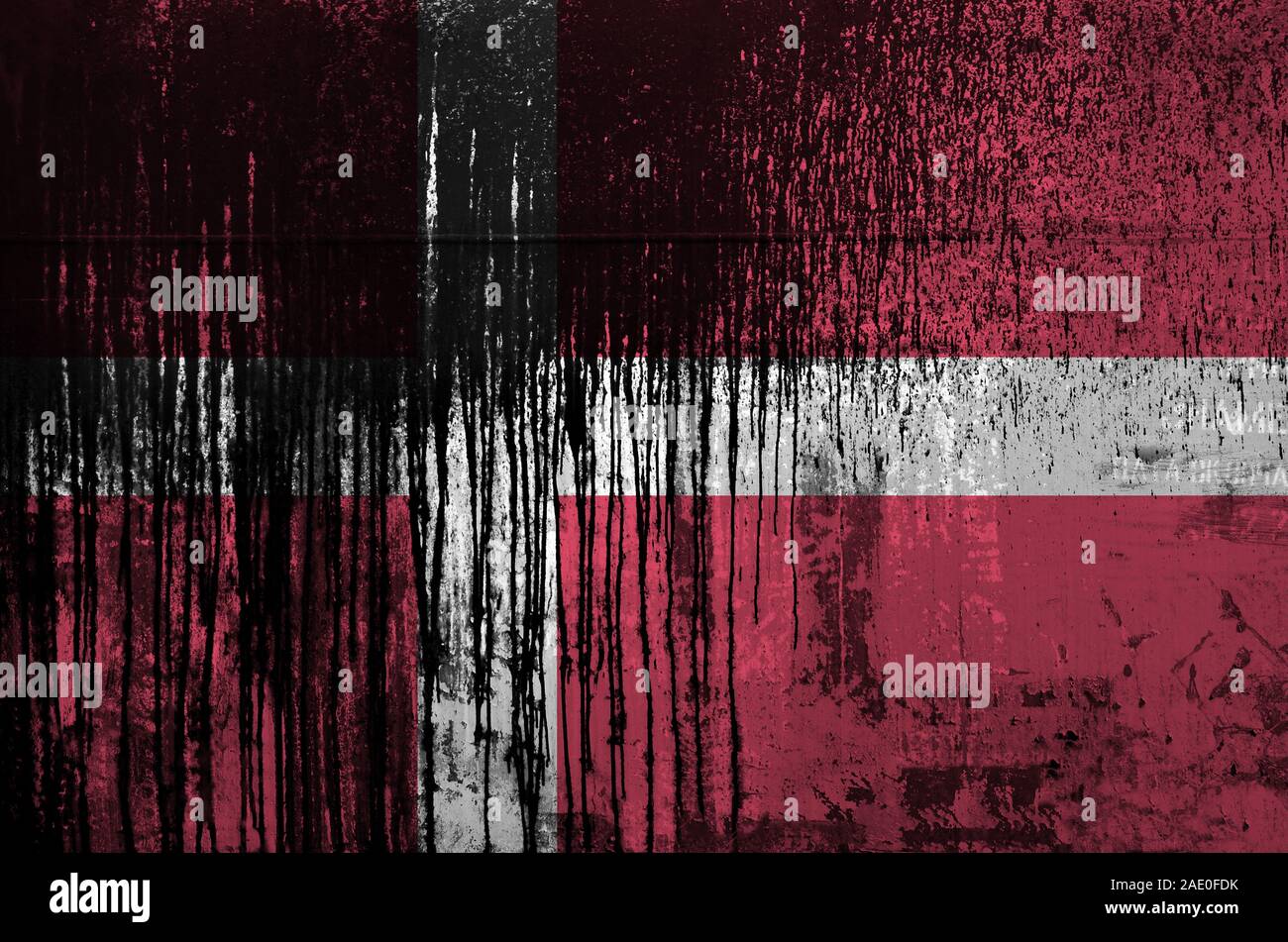 Denmark flag depicted in paint colors on old and dirty oil barrel wall ...