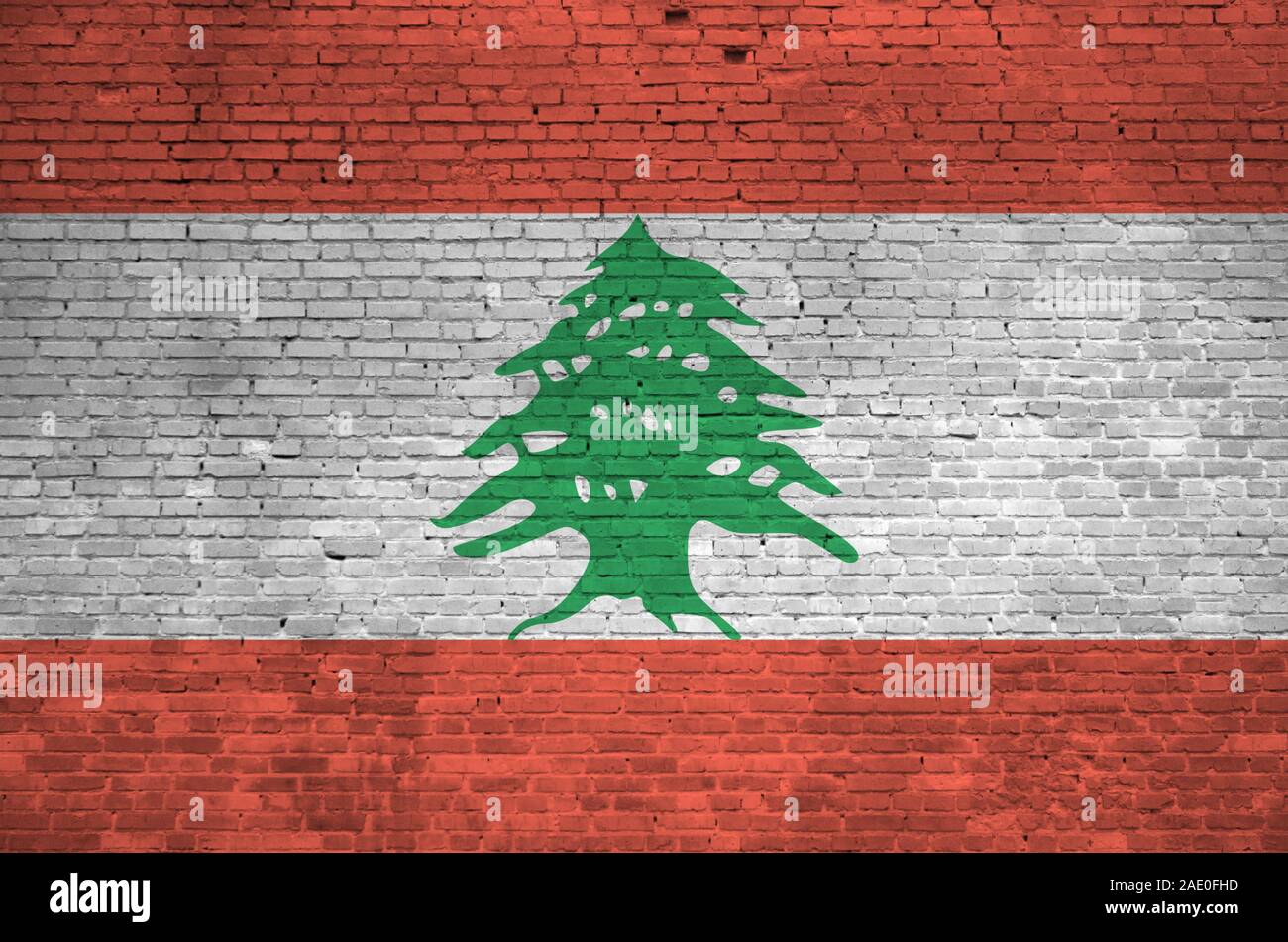 Lebanon flag depicted in paint colors on old brick wall close up ...