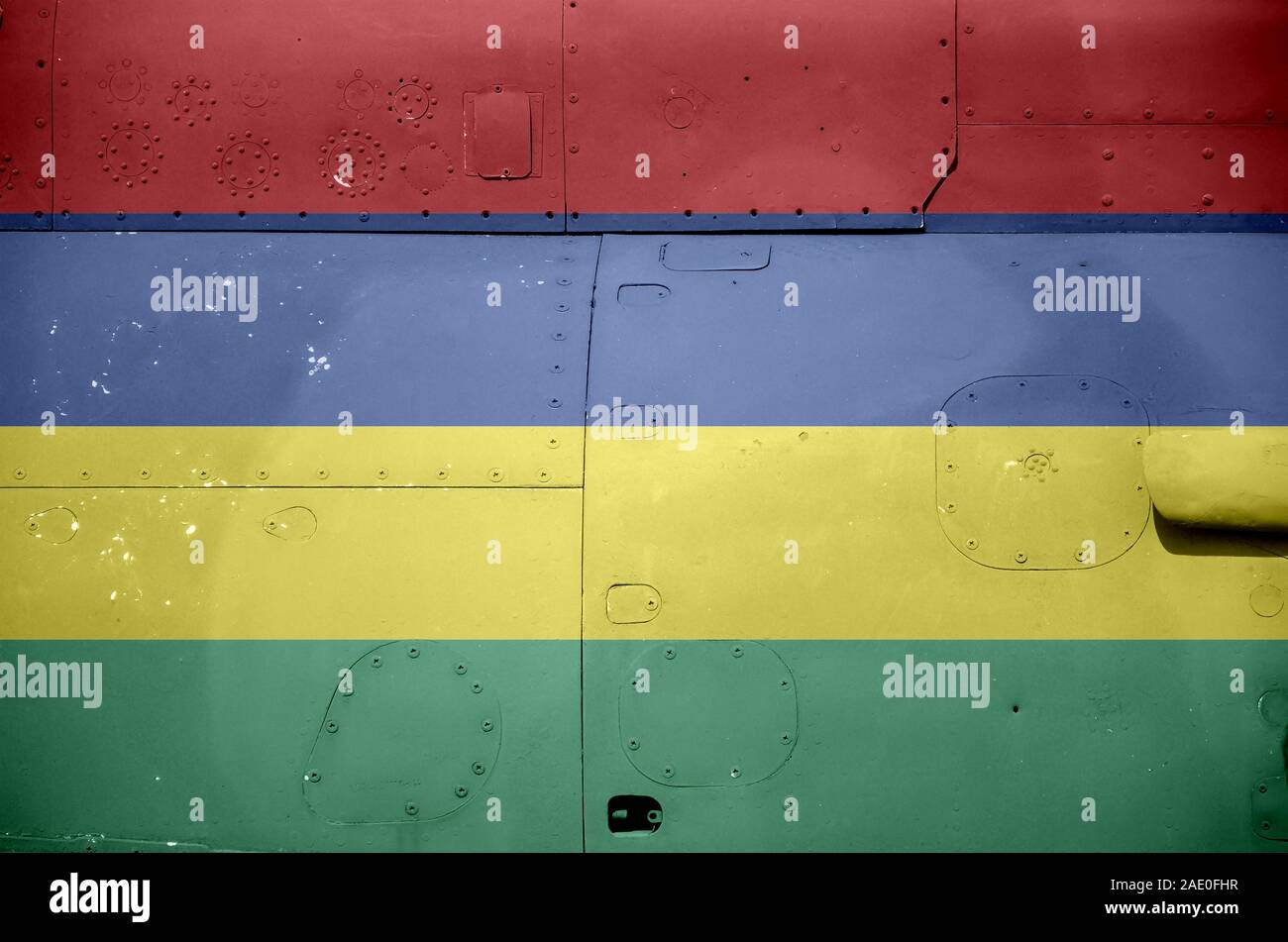 Mauritius flag depicted on side part of military armored helicopter ...