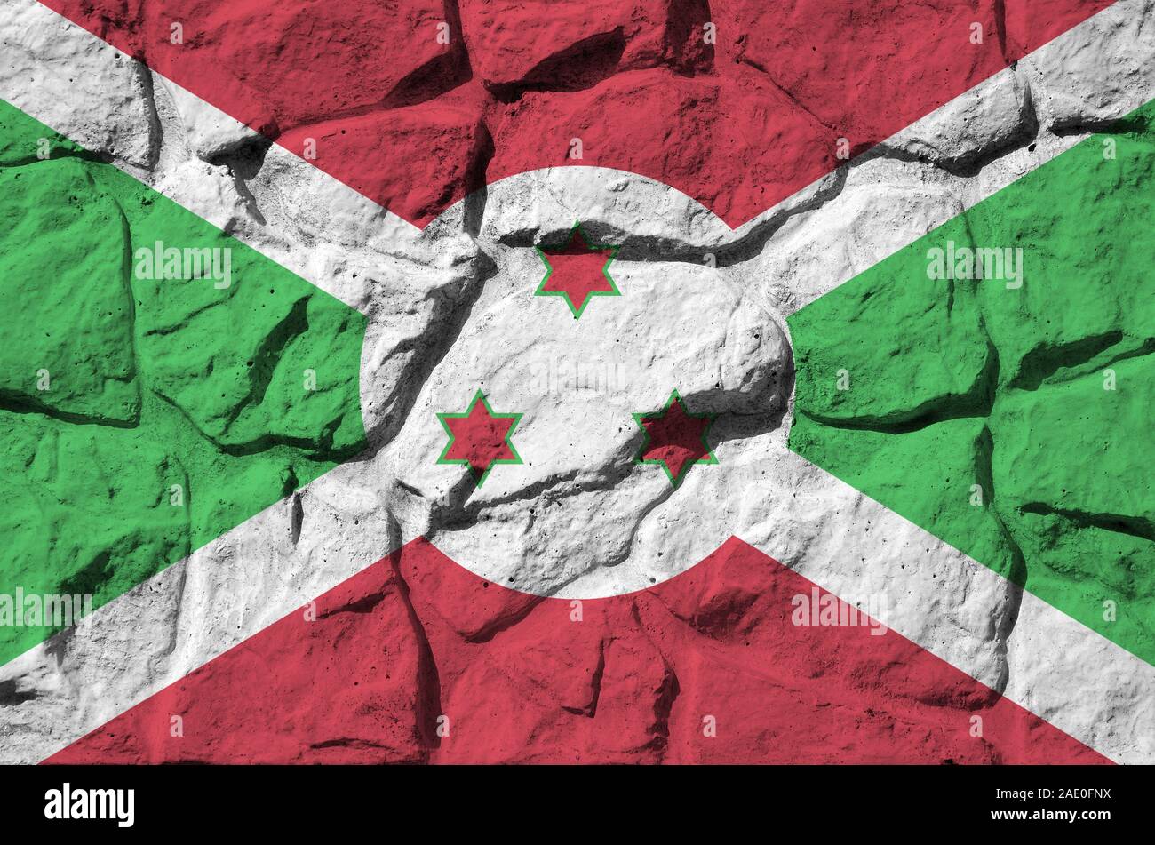 Burundi flag depicted in paint colors on old stone wall close up ...