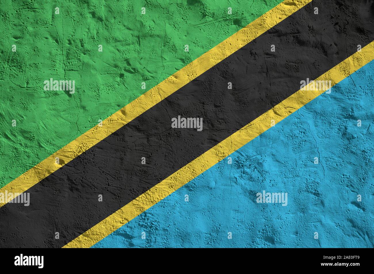 Tanzania flag depicted in bright paint colors on old relief plastering ...
