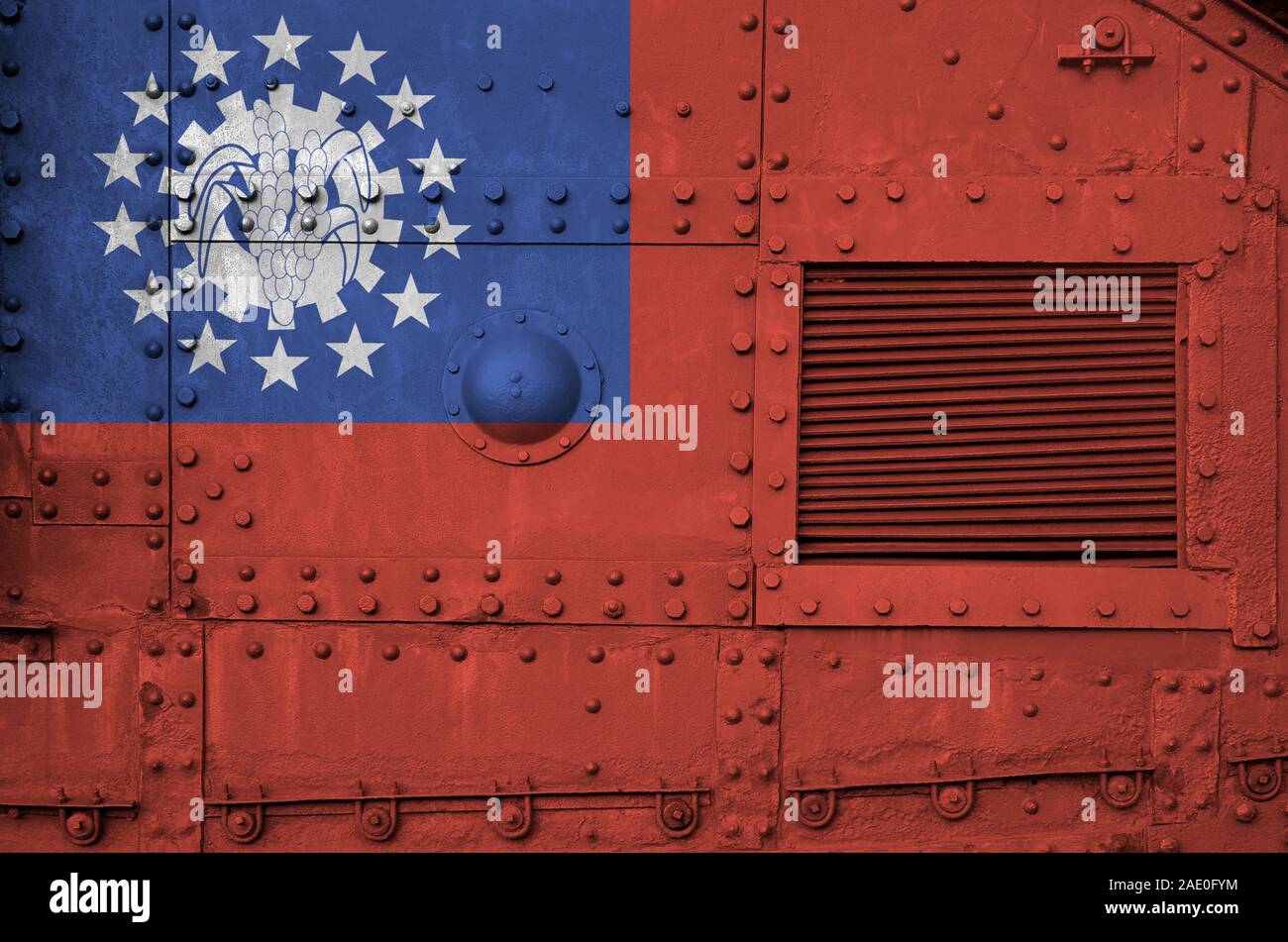 Myanmar flag depicted on side part of military armored tank close up ...